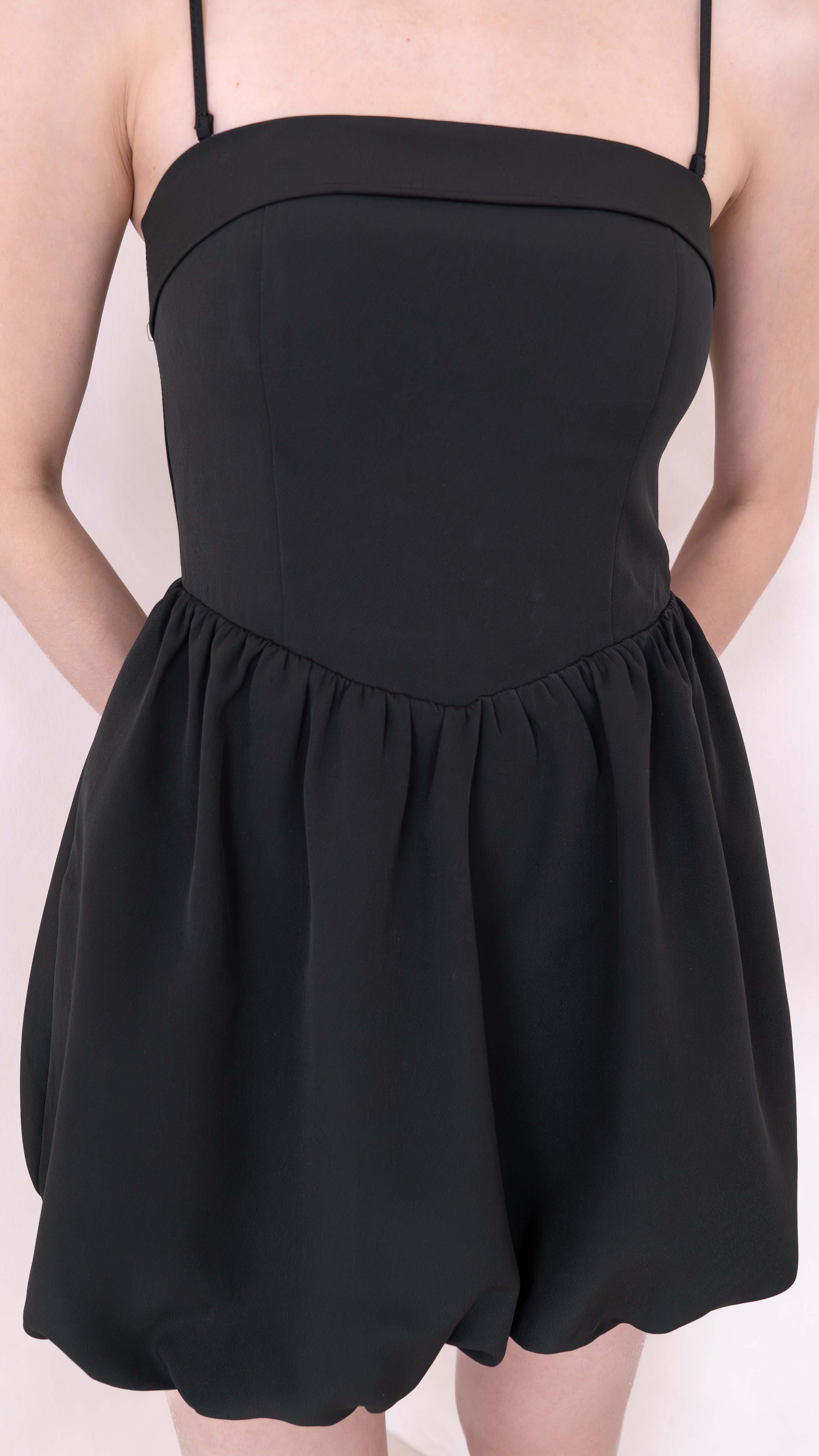 Mavis Overlap Panel Bubble Dress Romper in Black | Mikayla